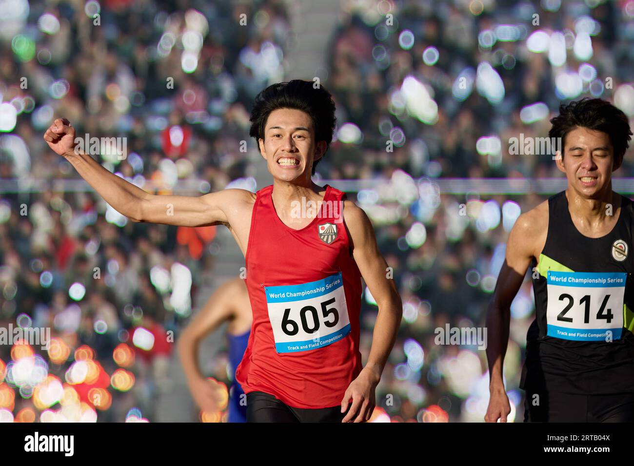 Japanese athletes running on track Stock Photo - Alamy