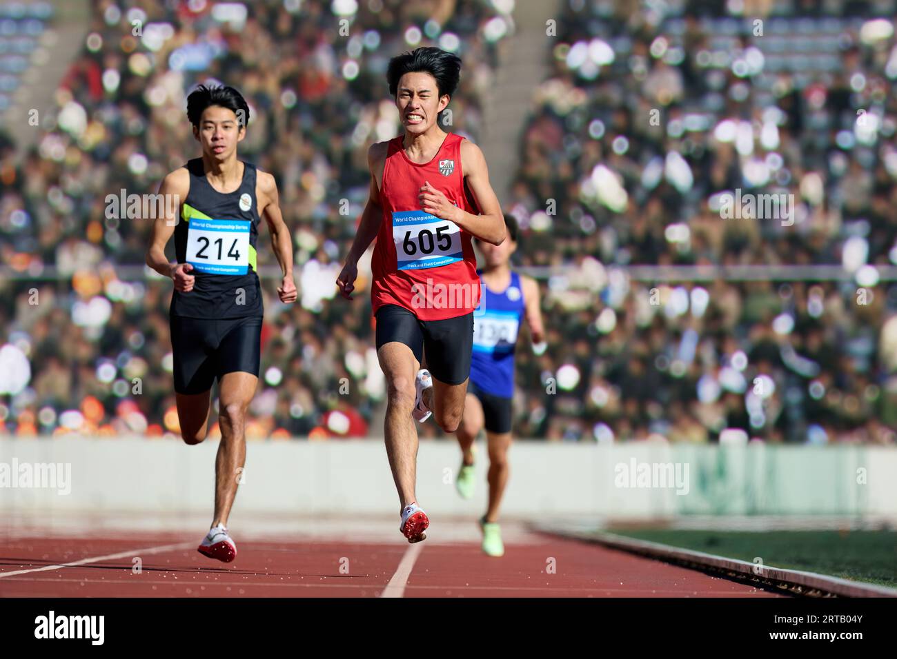 Japanese athletes running on track Stock Photo - Alamy