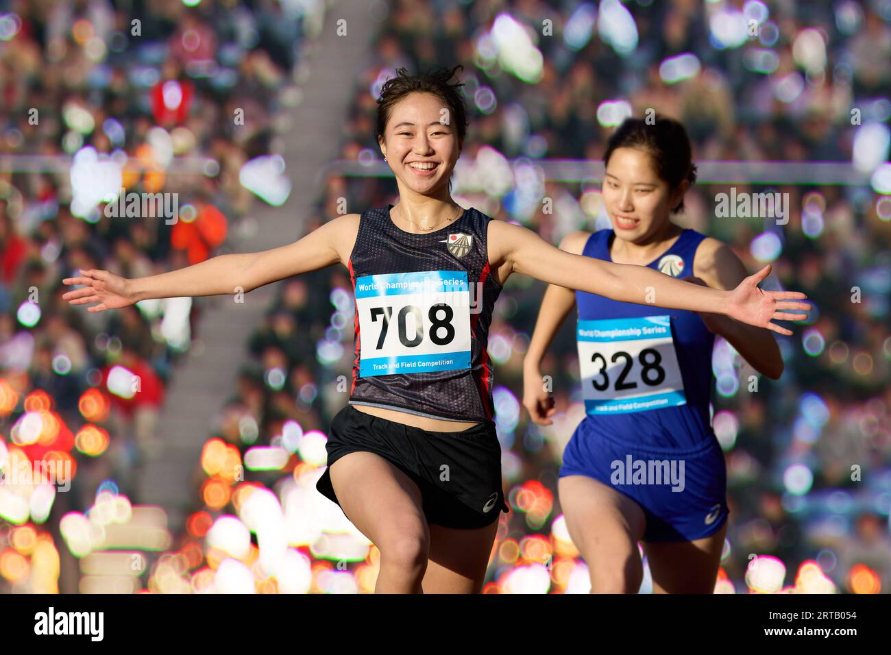 Japanese athletes running on track Stock Photo - Alamy