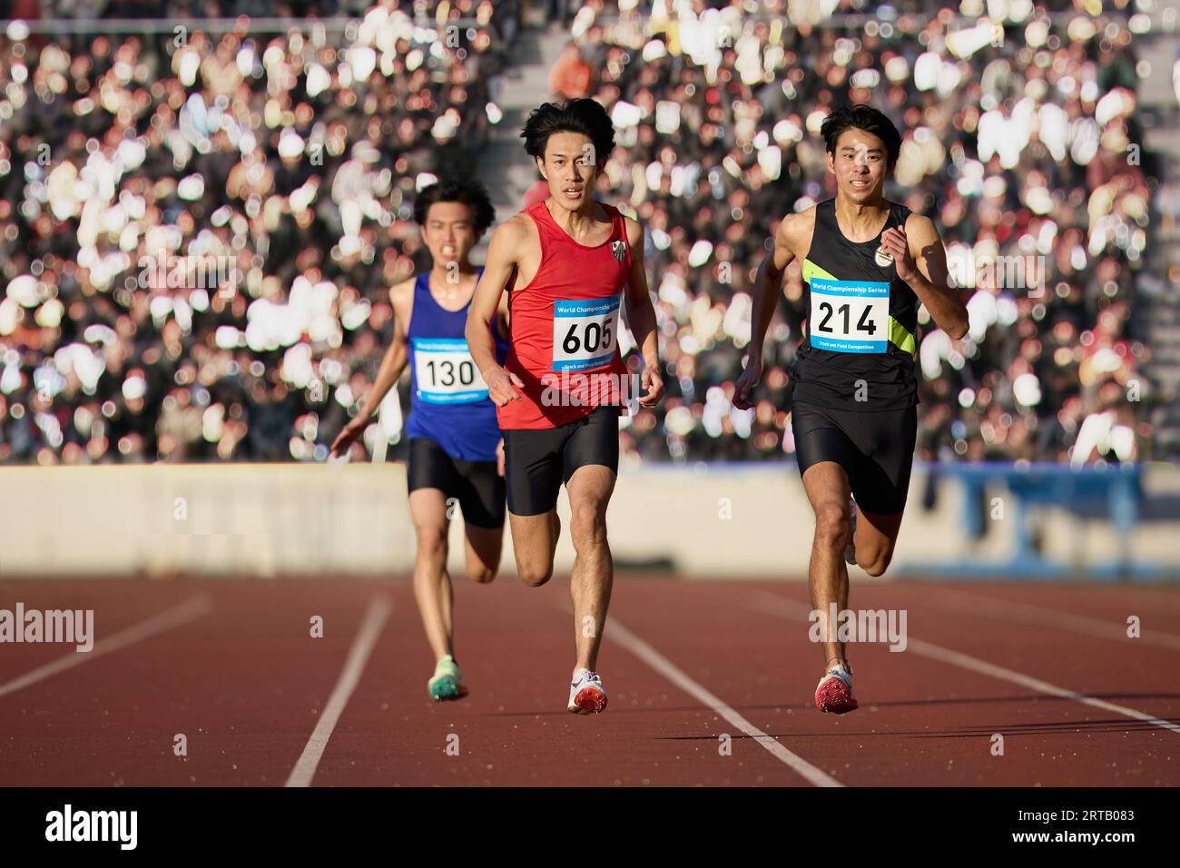 Japanese athletes running on track Stock Photo - Alamy