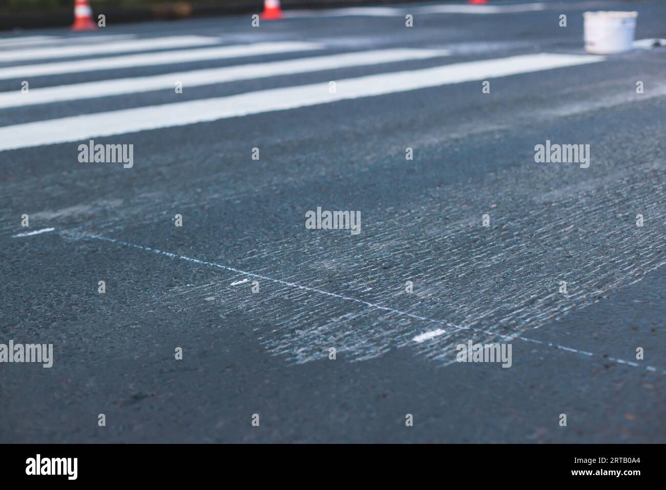 Process of making new road surface markings with a line striping ...