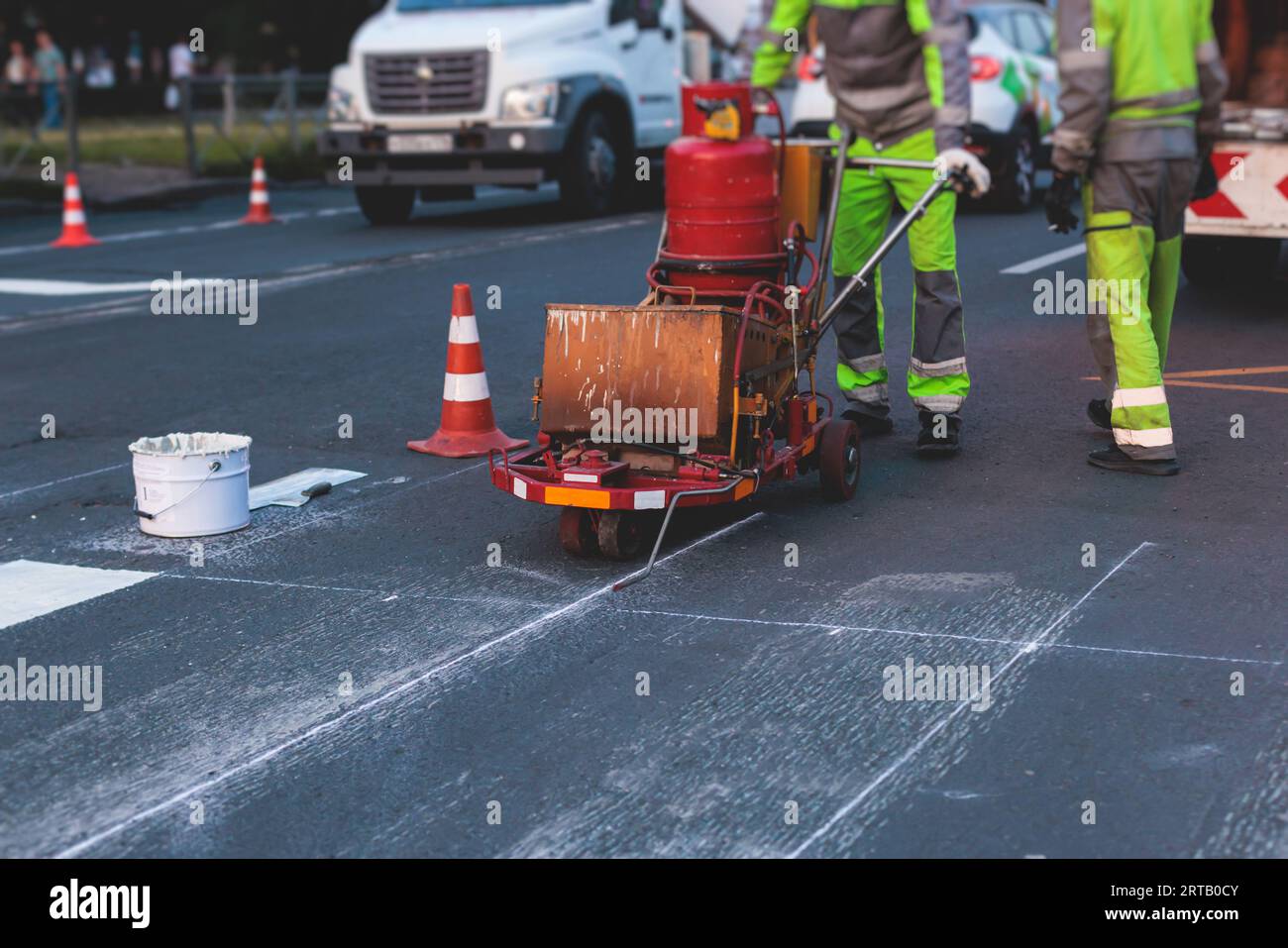 Process of making new road surface markings with a line striping ...