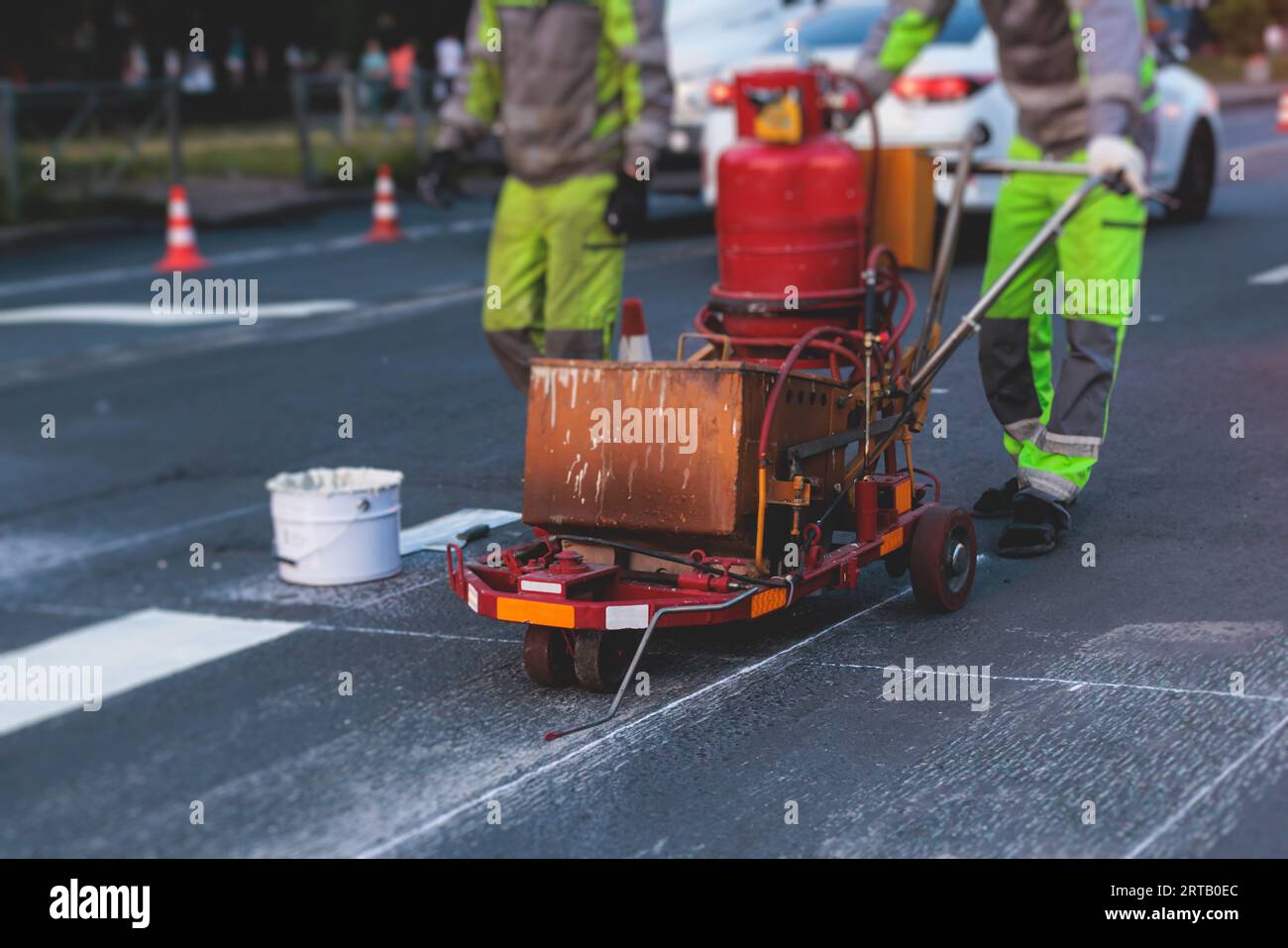 Process of making new road surface markings with a line striping ...