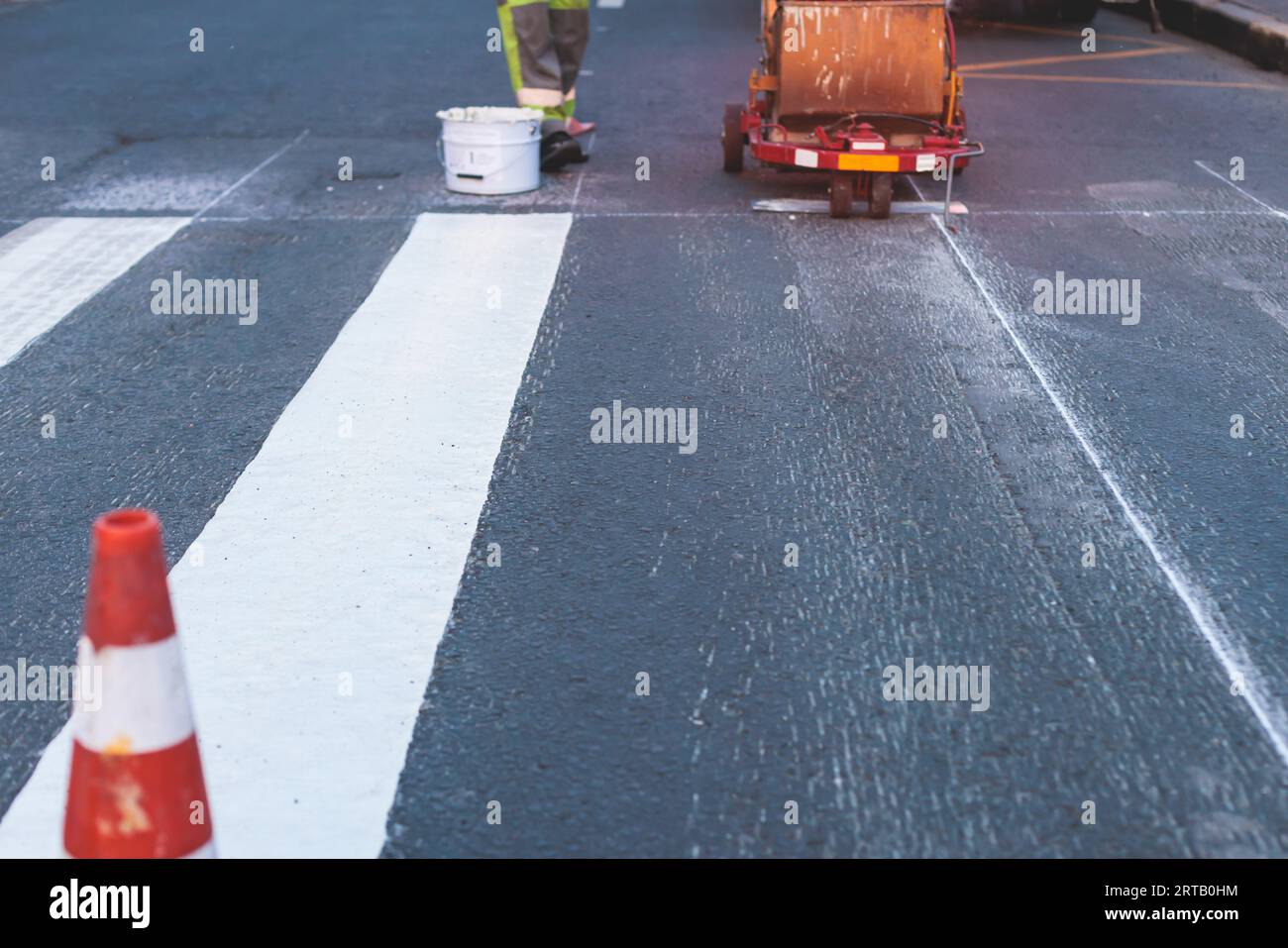 Process of making new road surface markings with a line striping ...