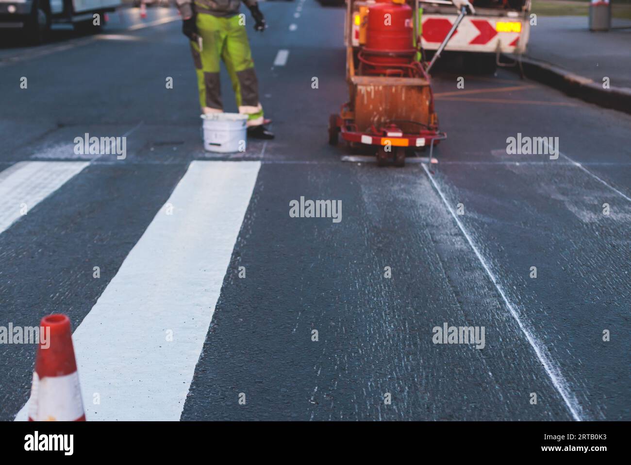 Process of making new road surface markings with a line striping ...