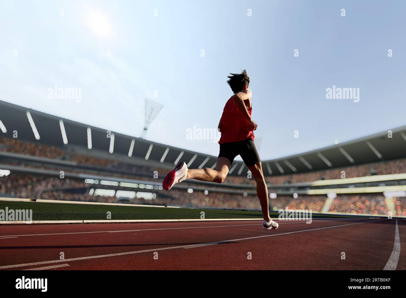 Japanese athlete running on track Stock Photo - Alamy
