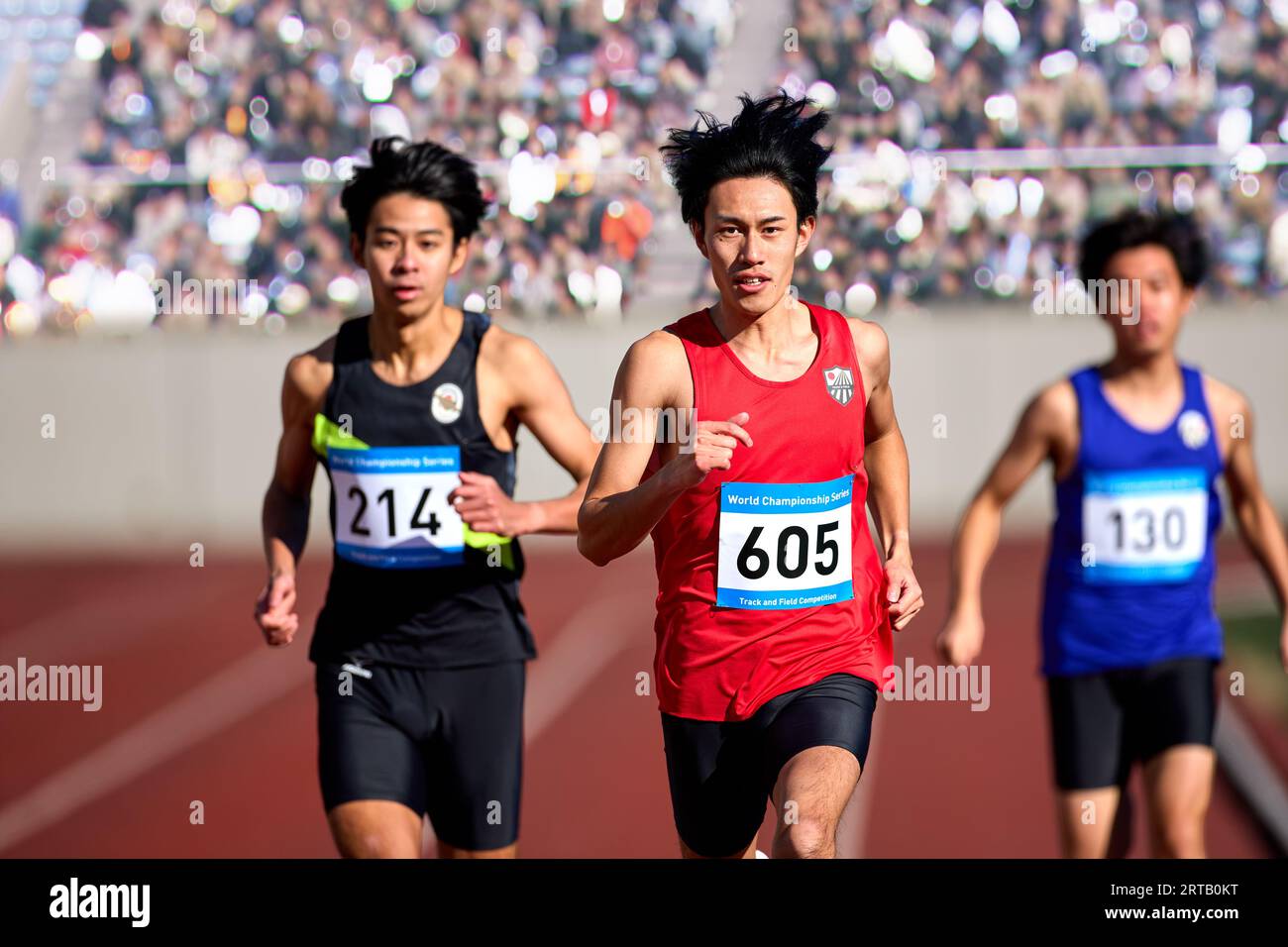Japanese athletes running on track Stock Photo - Alamy