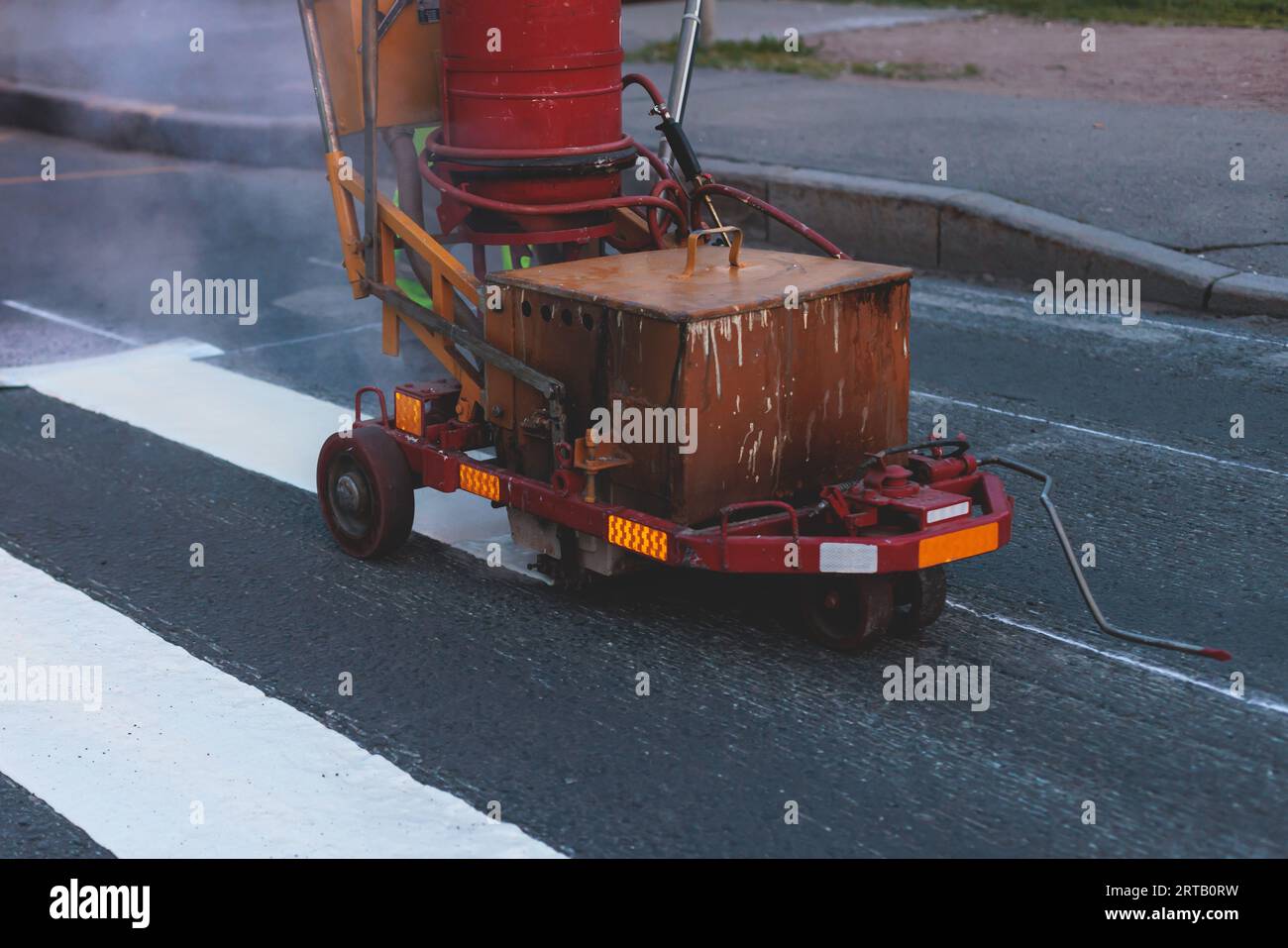 Process of making new road surface markings with a line striping ...
