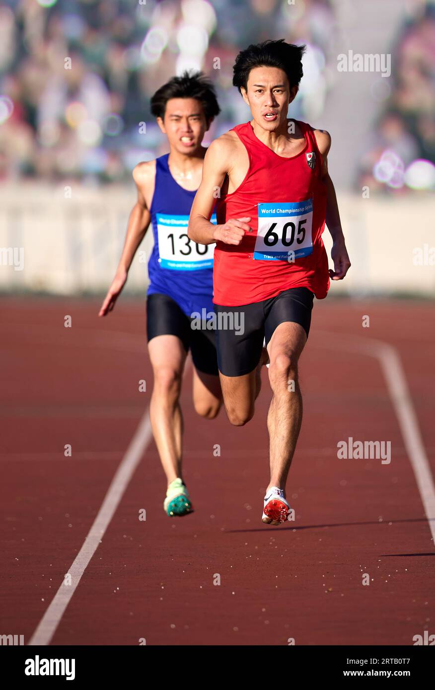 Japanese athletes running on track Stock Photo - Alamy