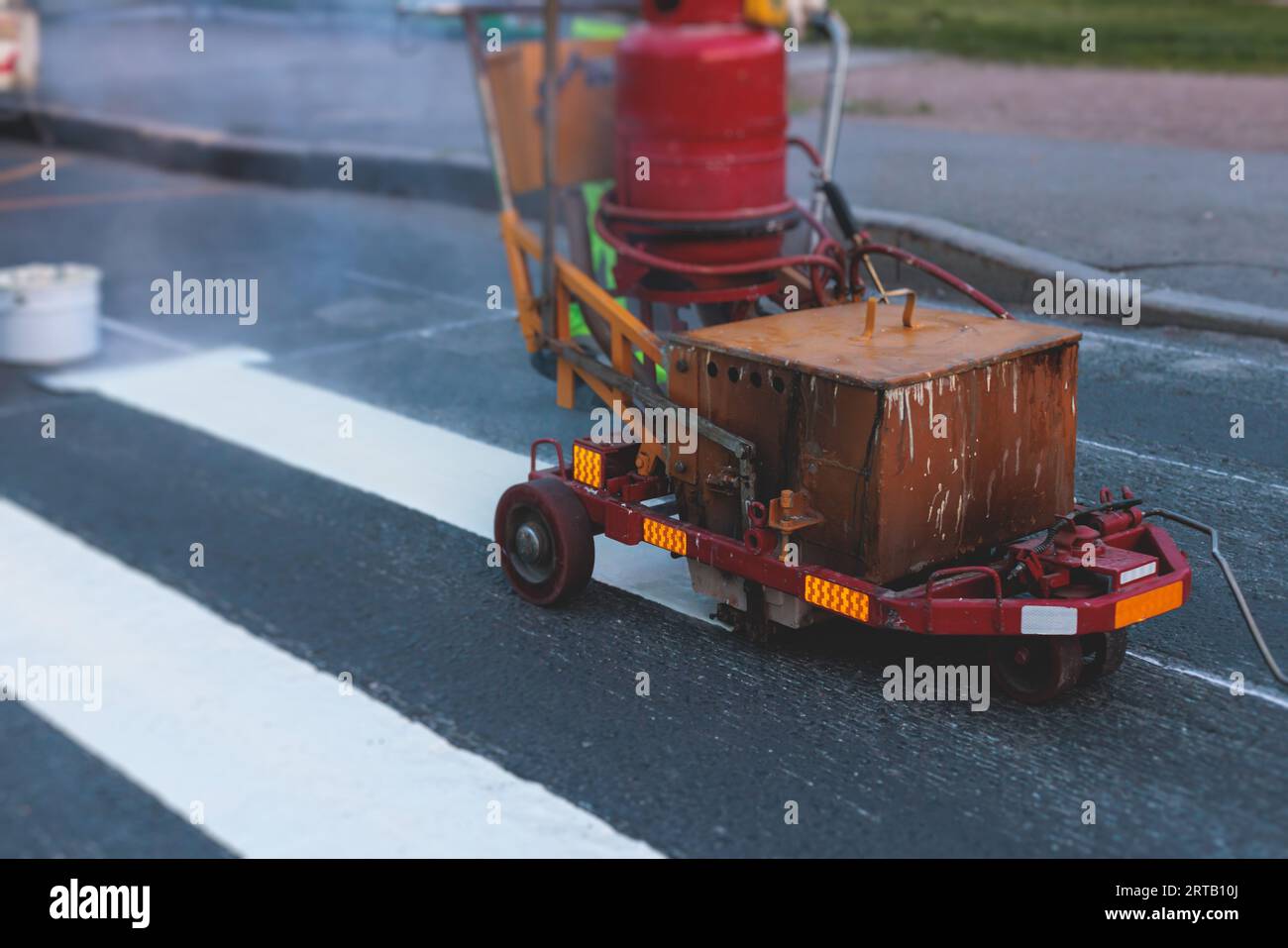 Process of making new road surface markings with a line striping ...