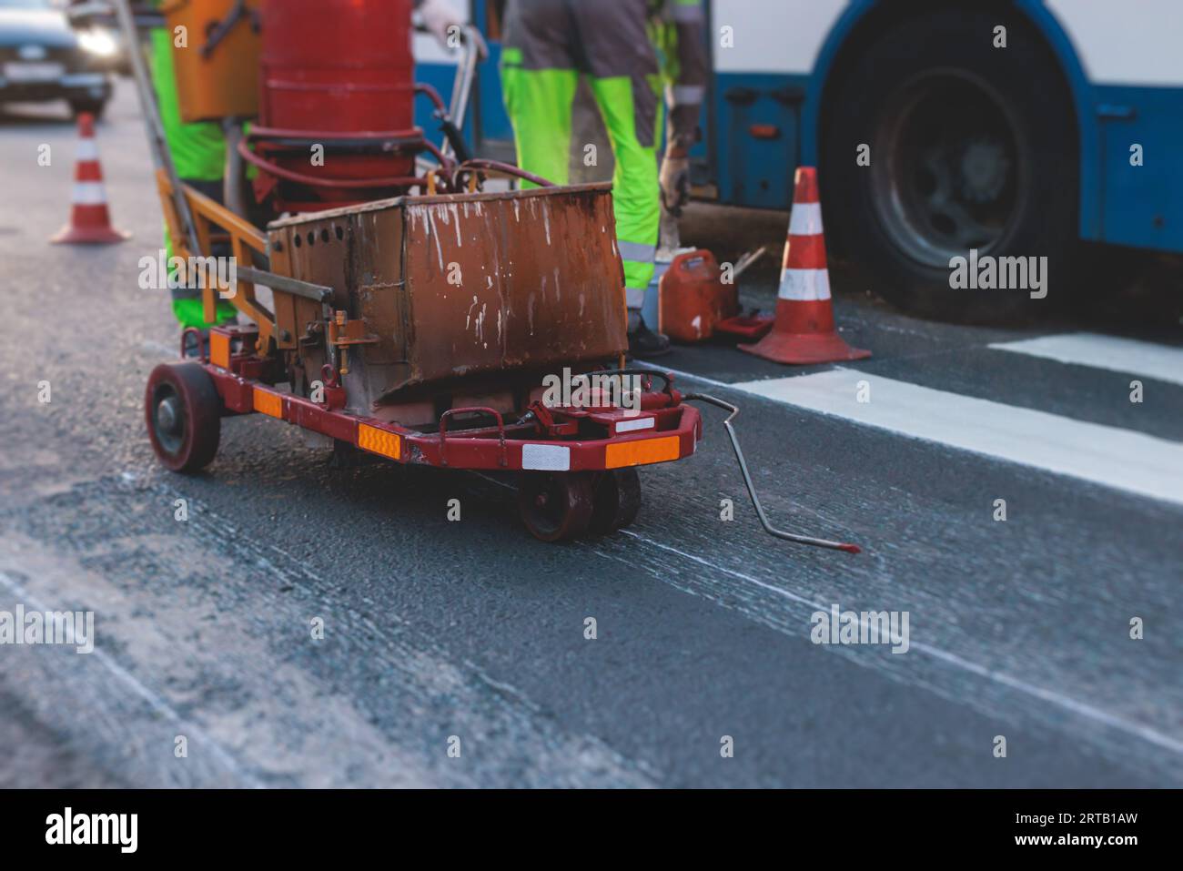 Process of making new road surface markings with a line striping ...
