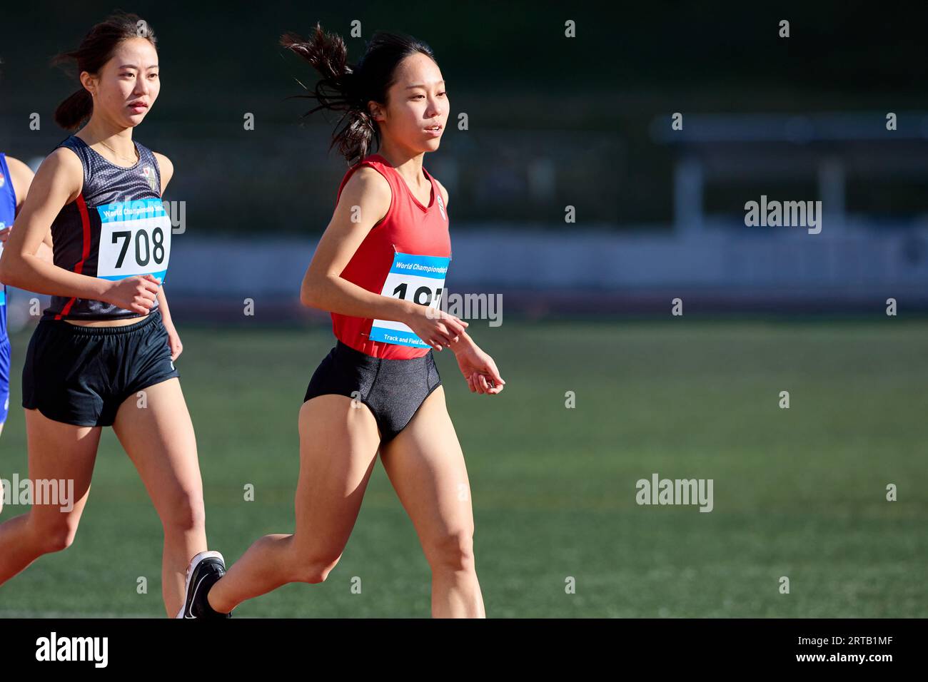 Japanese athletes running on track Stock Photo - Alamy