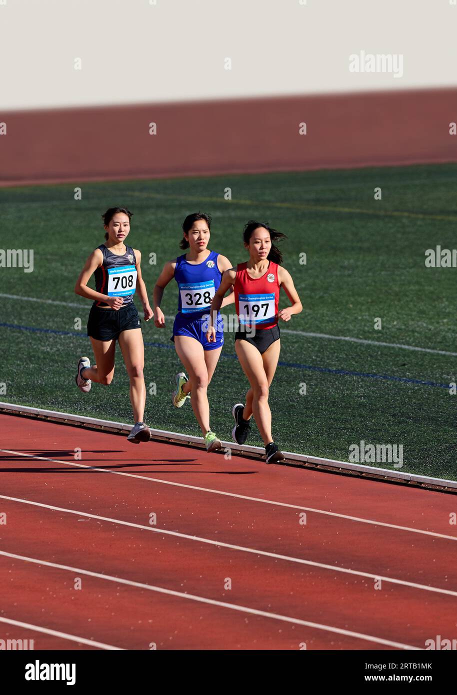Japanese athletes running on track Stock Photo - Alamy