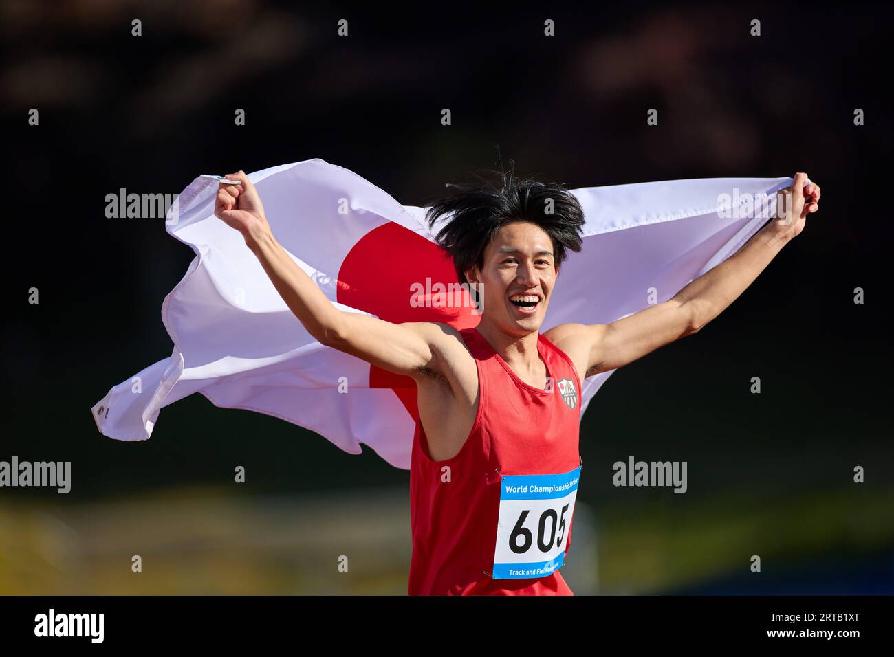 Japanese athlete running on track Stock Photo - Alamy