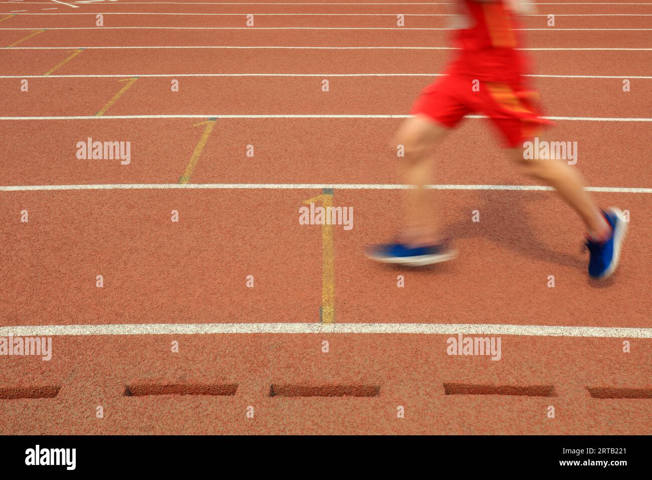 Long distance runners are running on the track Stock Photo - Alamy