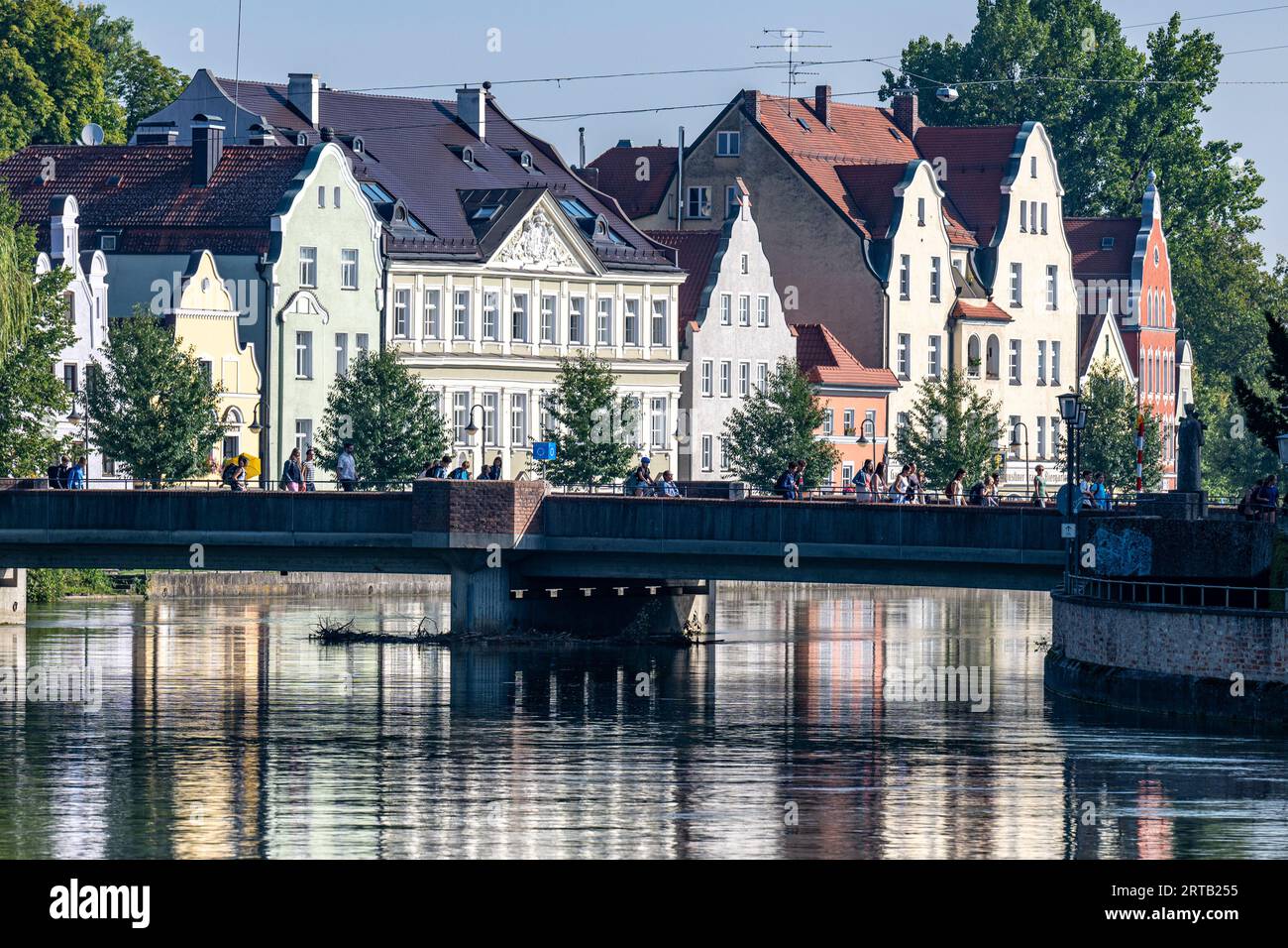 Landshut, Germany. 12th Sep, 2023. Pedestrians walk on a bridge over ...