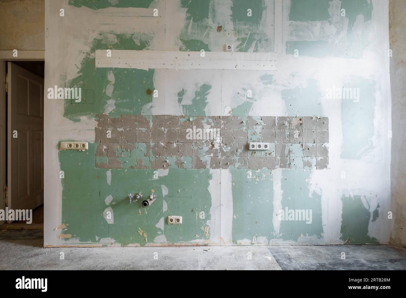 dry wall during kitchen renovation, home improvement Stock Photo - Alamy