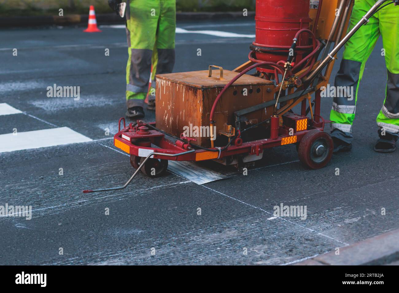 Process of making new road surface markings with a line striping ...