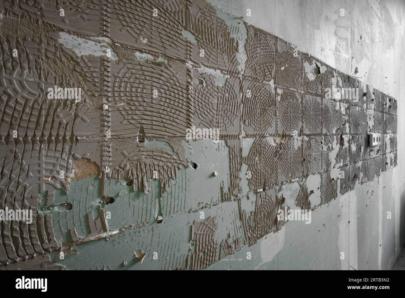 removed tiles from dry wall during kitchen renovation Stock Photo - Alamy