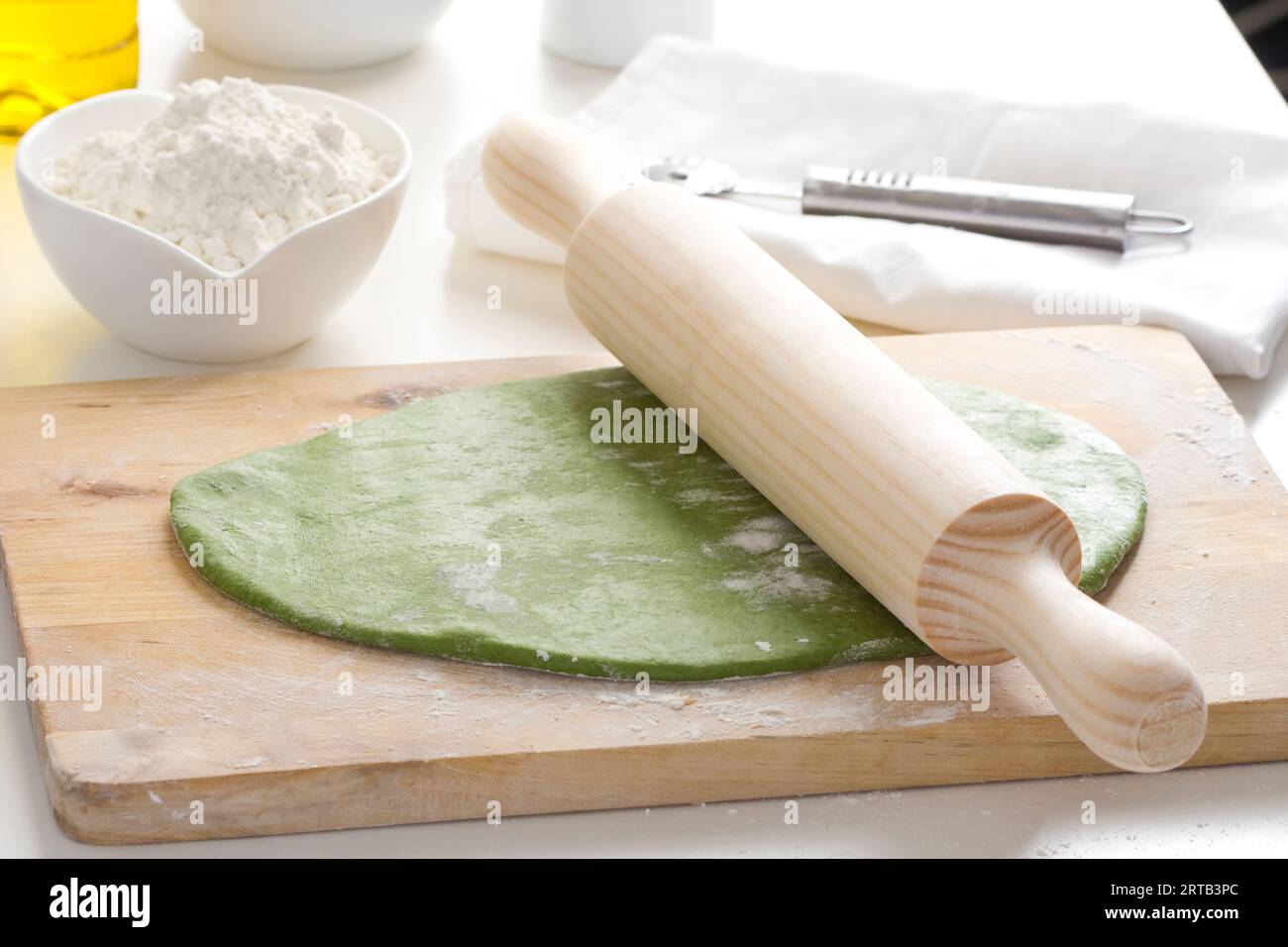 preparation of dough with spinach for fresh pasta Stock Photo - Alamy