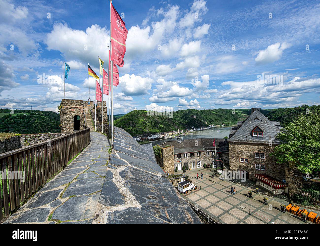 Walkway to the clock tower at Rheinfels Castle, view of the square in ...
