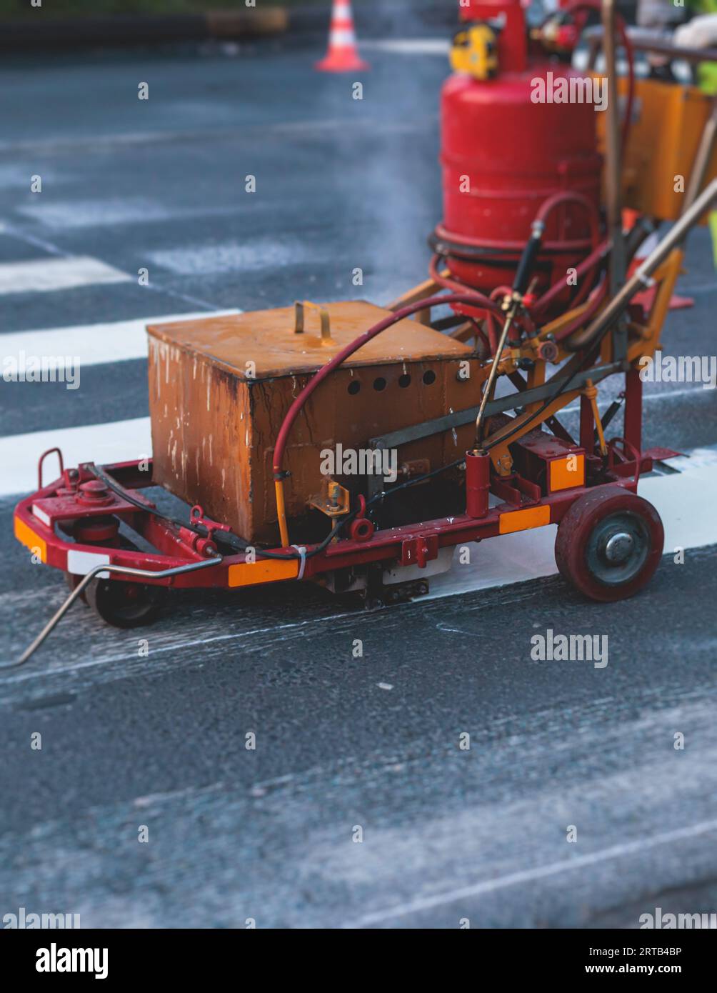 Process of making new road surface markings with a line striping ...