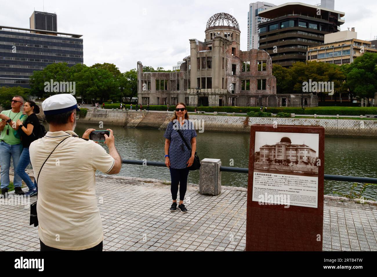 People visit the Atomic Bomb Dome in the city of Hiroshima, western ...