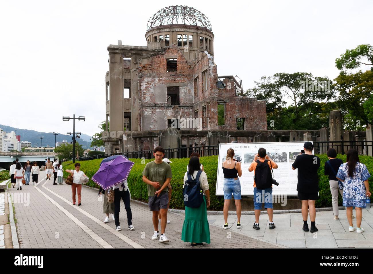 People visit the Atomic Bomb Dome in the city of Hiroshima, western ...