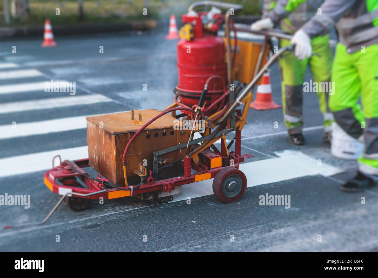 Process of making new road surface markings with a line striping ...