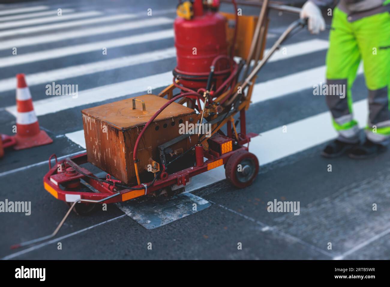 Process of making new road surface markings with a line striping ...
