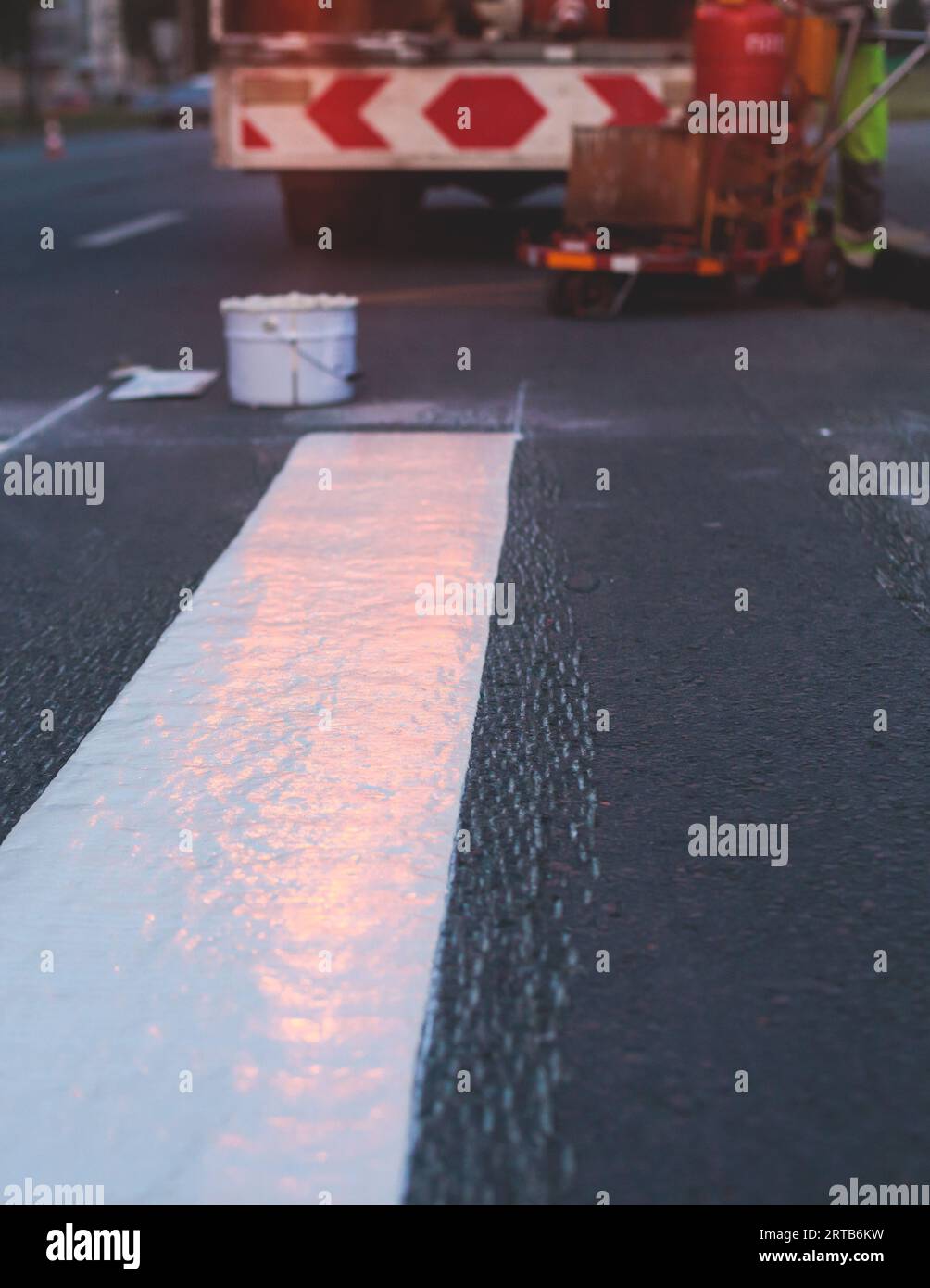 Process of making new road surface markings with a line striping ...
