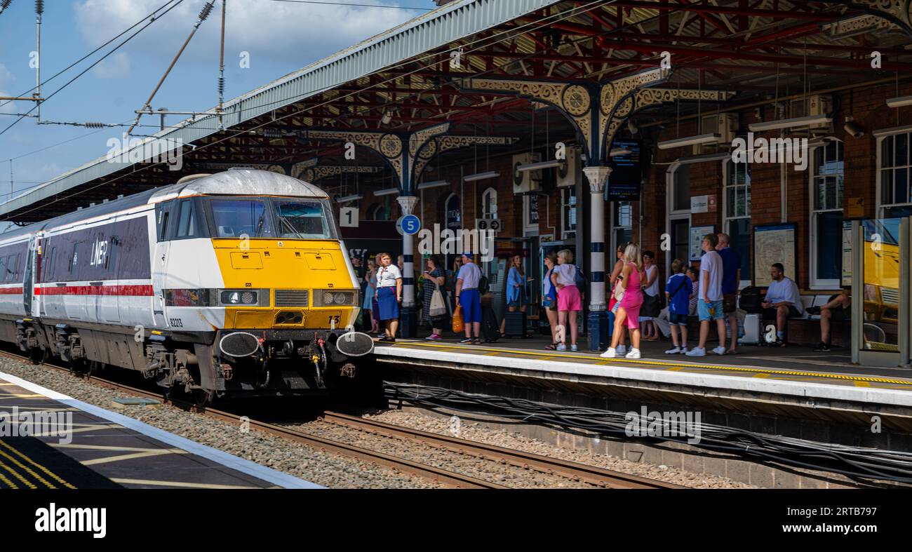 Grantham, Lincolnshire, UK – A train arriving at Grantham Train Station ...