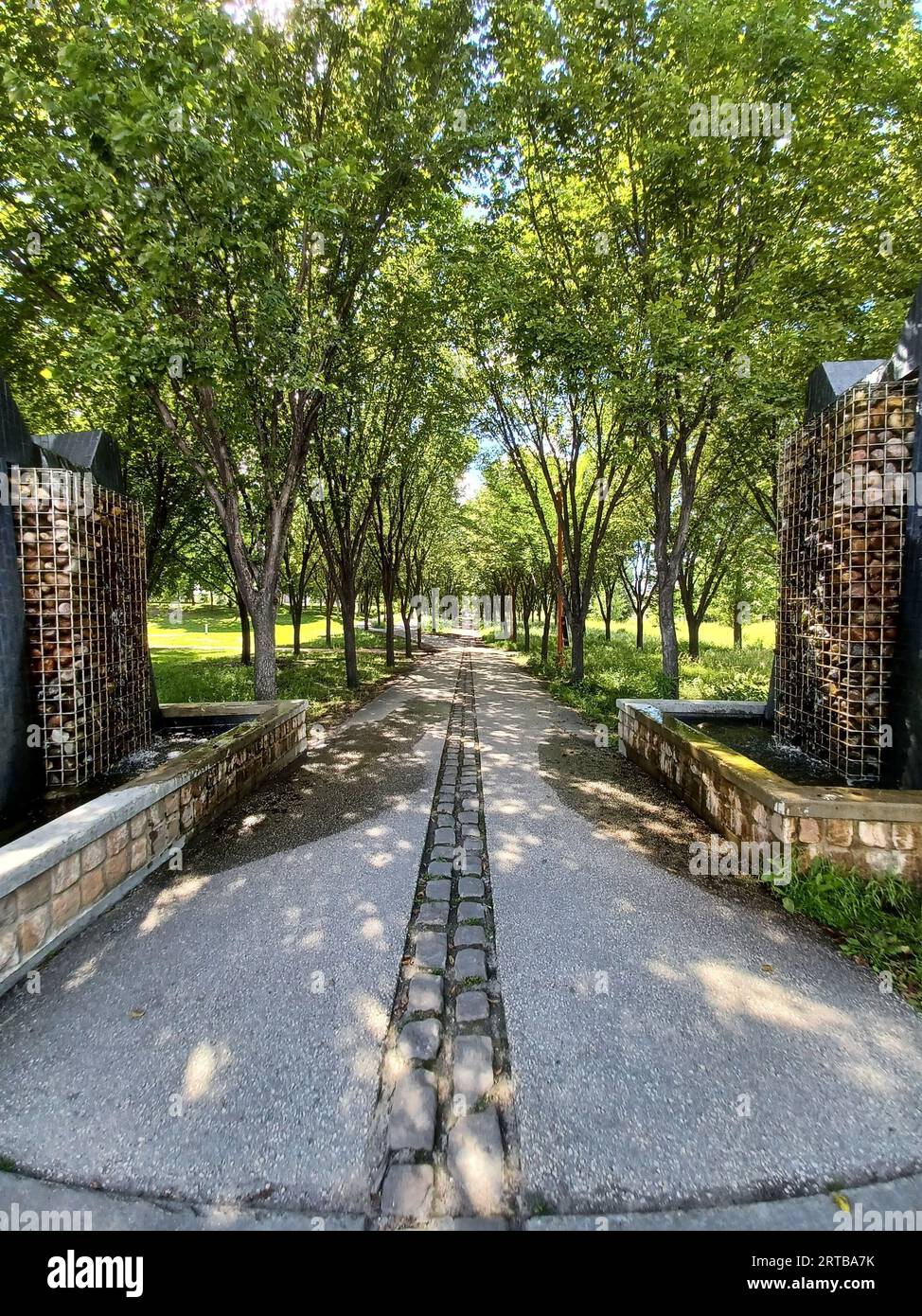 Pavement surrounded by greenery hi-res stock photography and images - Alamy