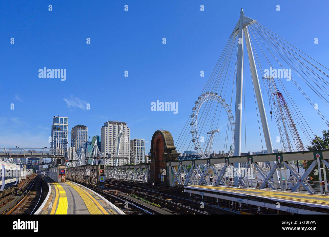 London, UK. Charing Cross Station - end of a platform with a view of ...