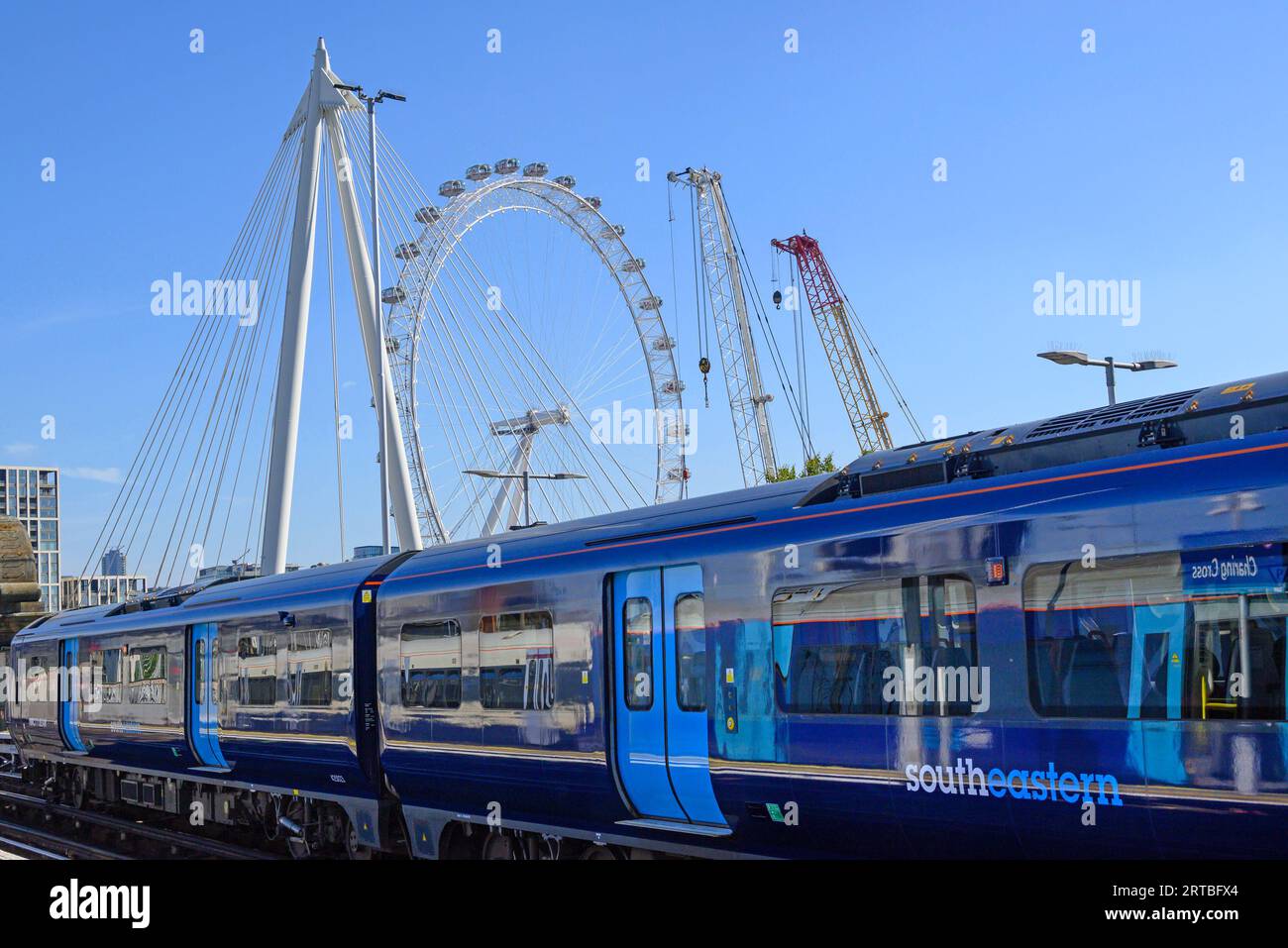 London, UK. Charing Cross Station - end of a platform with a view of ...