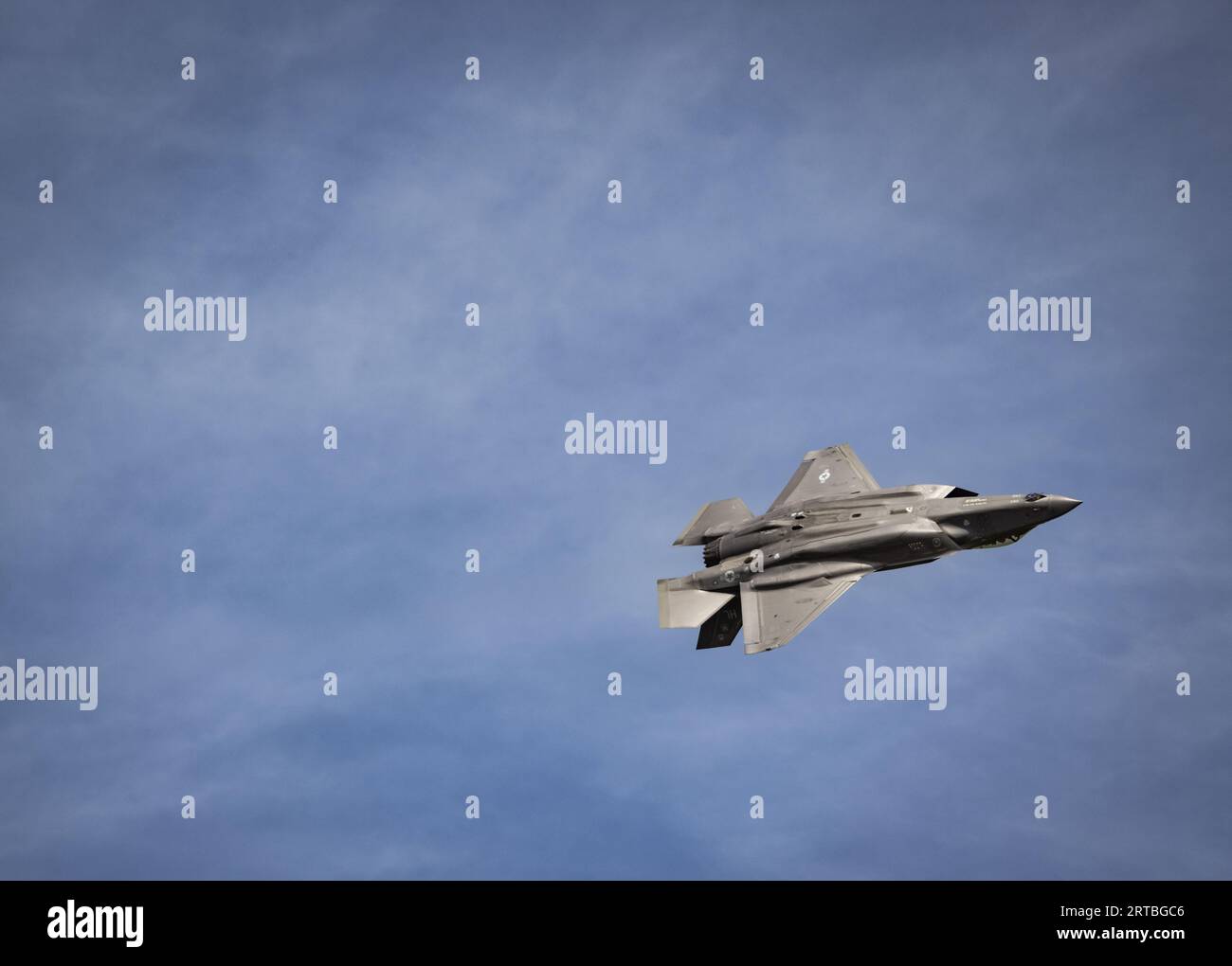 A United States Air Force F-35 flighting inverted during a ...