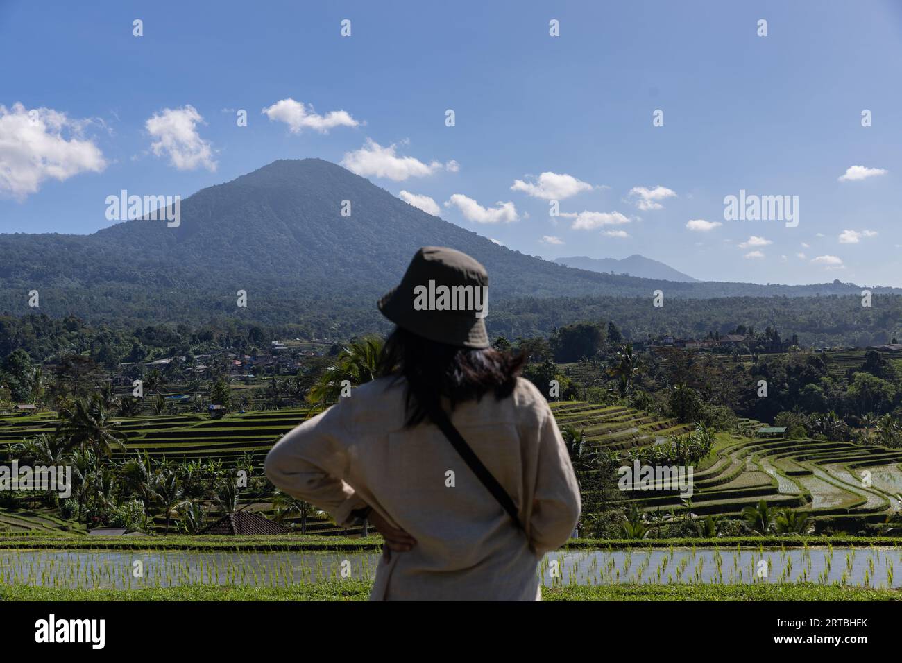 An Indonesian girl taking in the breathtaking landscapes of the UNESCO ...