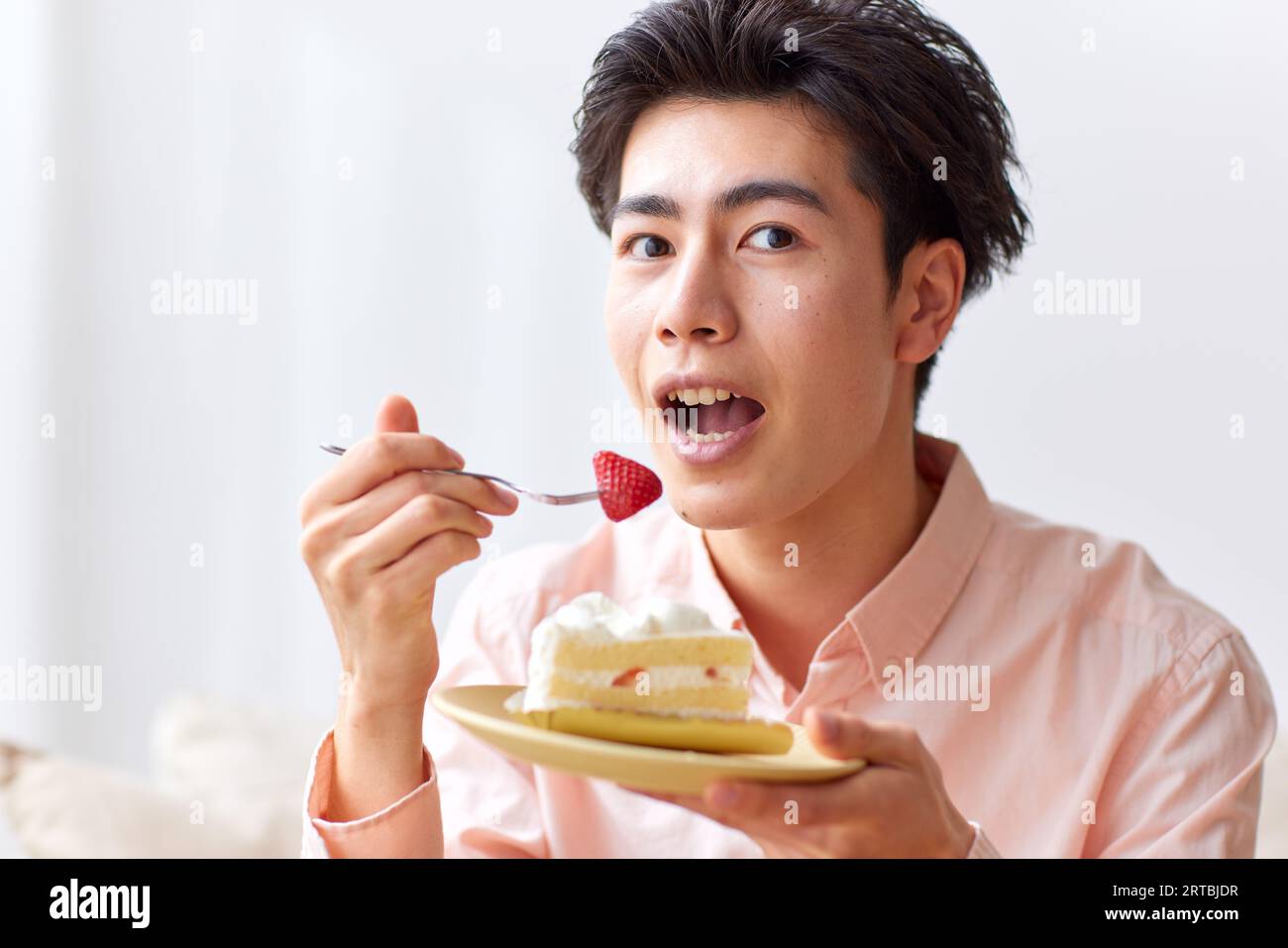 Eating cake with fork hi-res stock photography and images - Alamy