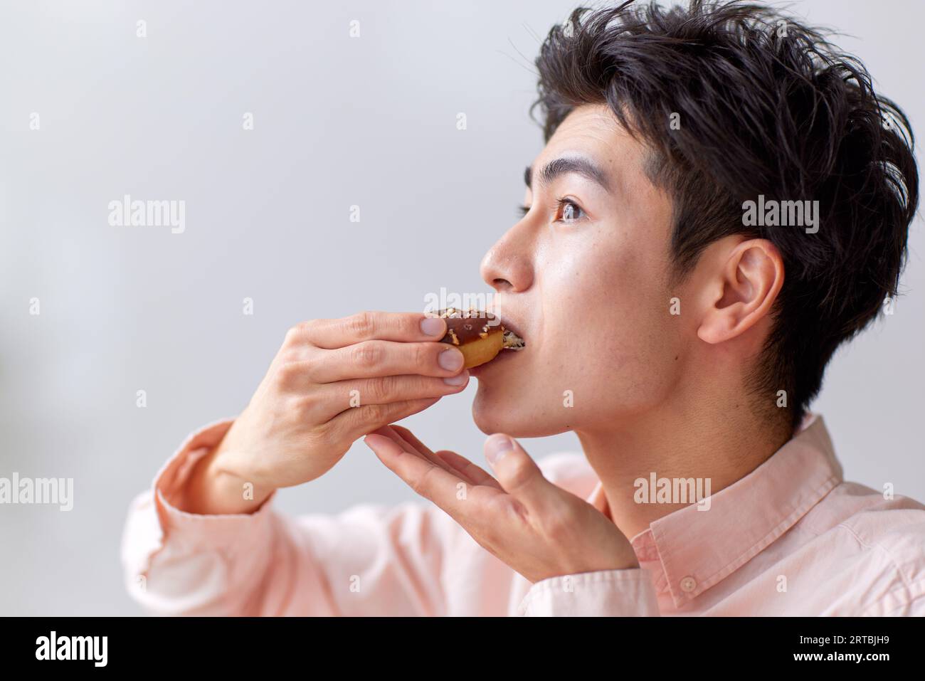 Man spilling food hi-res stock photography and images - Alamy