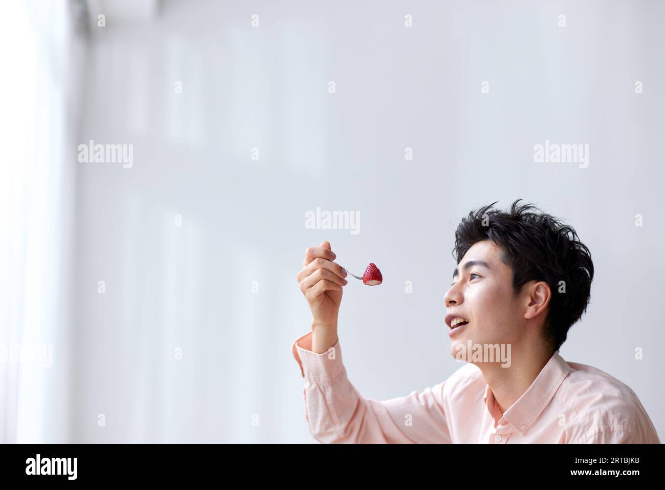 Adult eating fruit hi-res stock photography and images - Alamy