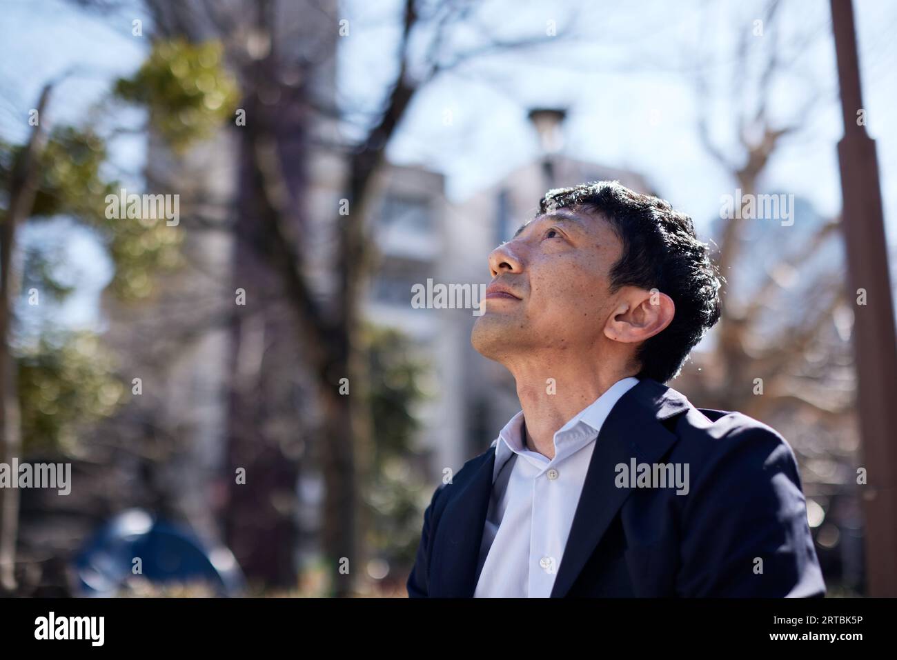 Stressed Japanese man Stock Photo - Alamy