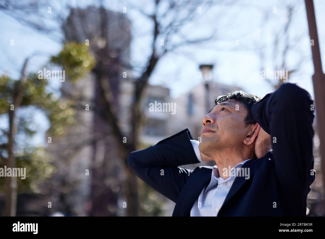 Stressed Japanese man Stock Photo - Alamy
