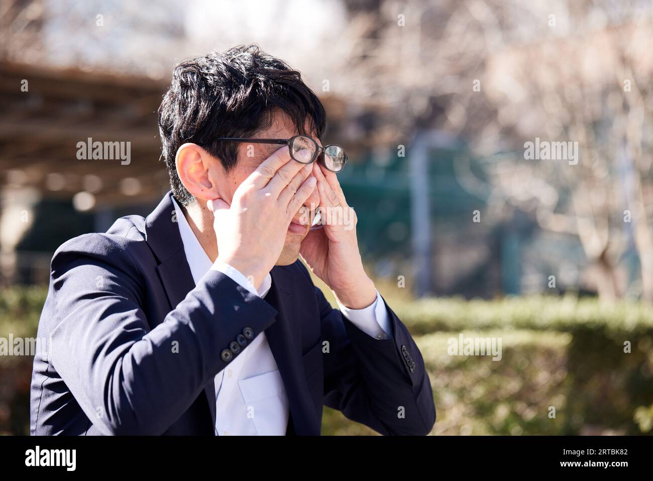 Stressed Japanese man Stock Photo - Alamy