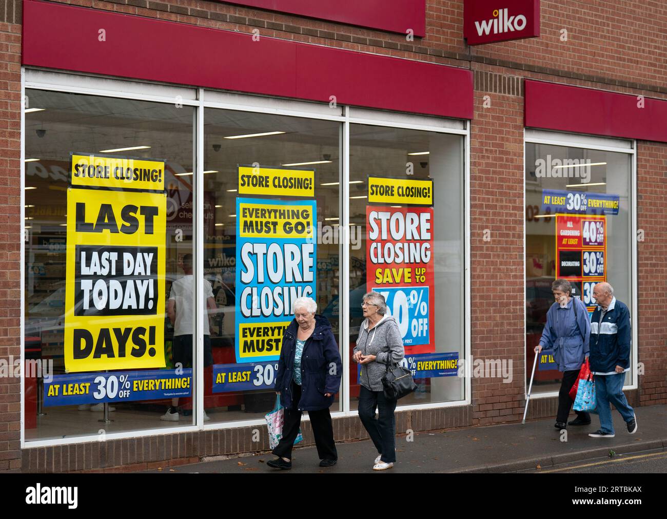 Customers walk past Wilko in Brownhills near Walsall, one of the first ...