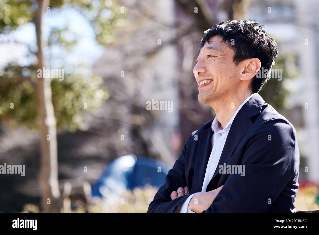 Japanese businessman smiling hi-res stock photography and images - Alamy