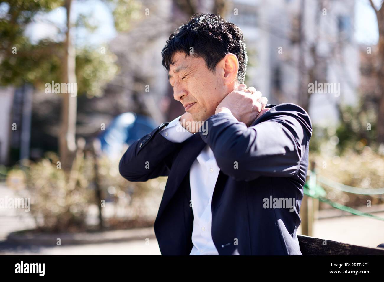 Stressed Japanese man Stock Photo - Alamy