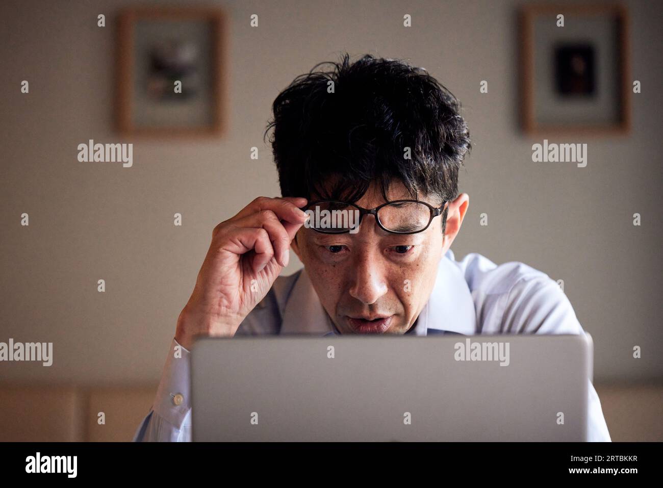 Japanese man with poor sight Stock Photo - Alamy