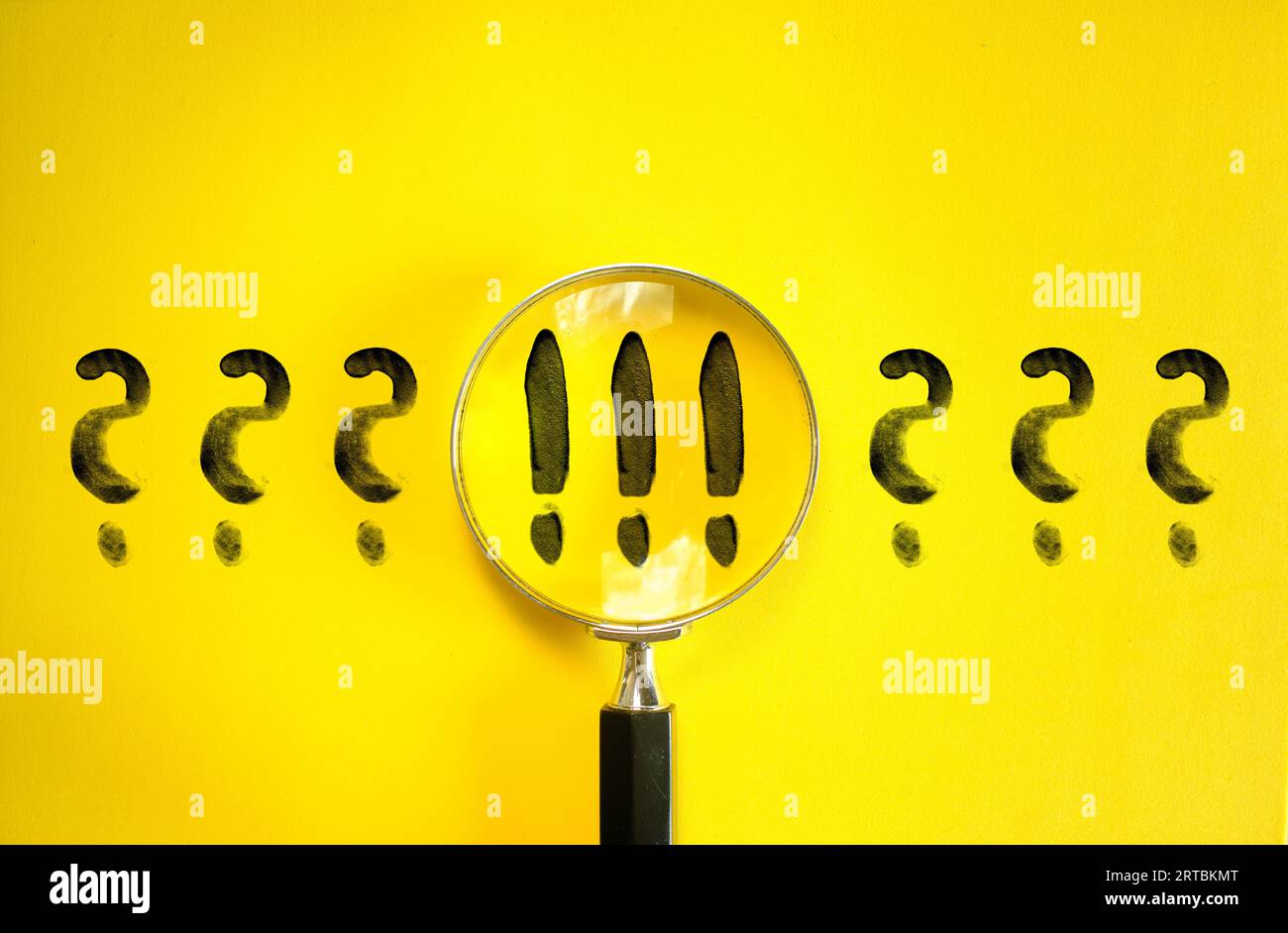 Magnifier enlarging the correct choice or check mark on yellow ...