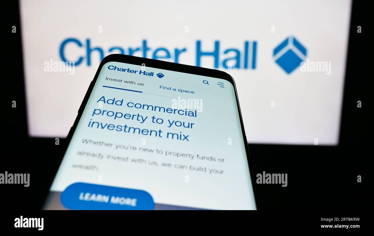 Smartphone with website of real estate company Charter Hall Group on ...