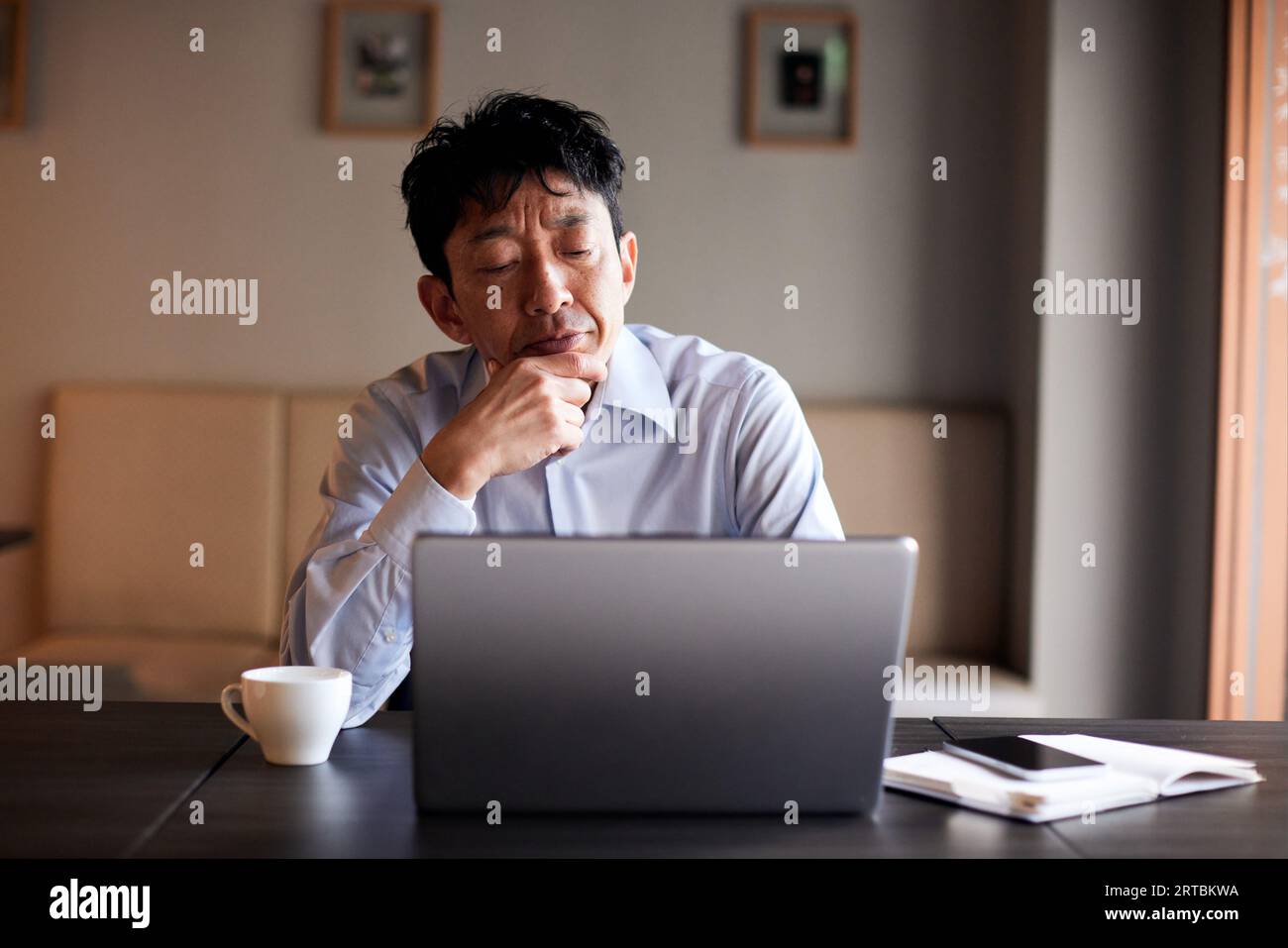 Stressed Japanese man Stock Photo - Alamy